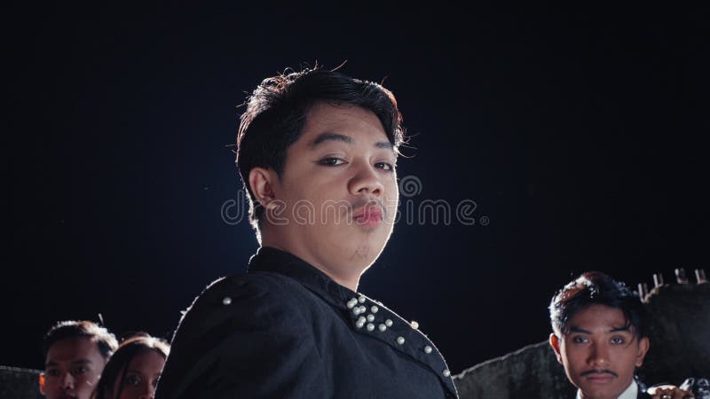 Confident Young Man in Dramatic Lighting Stock Video - Video of ...