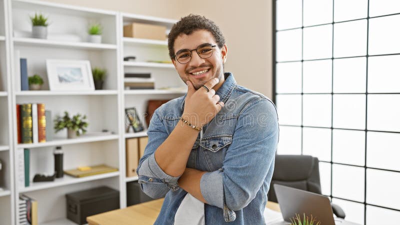 Confident Young Man with Glasses and Beard Smiling in Modern Office ...