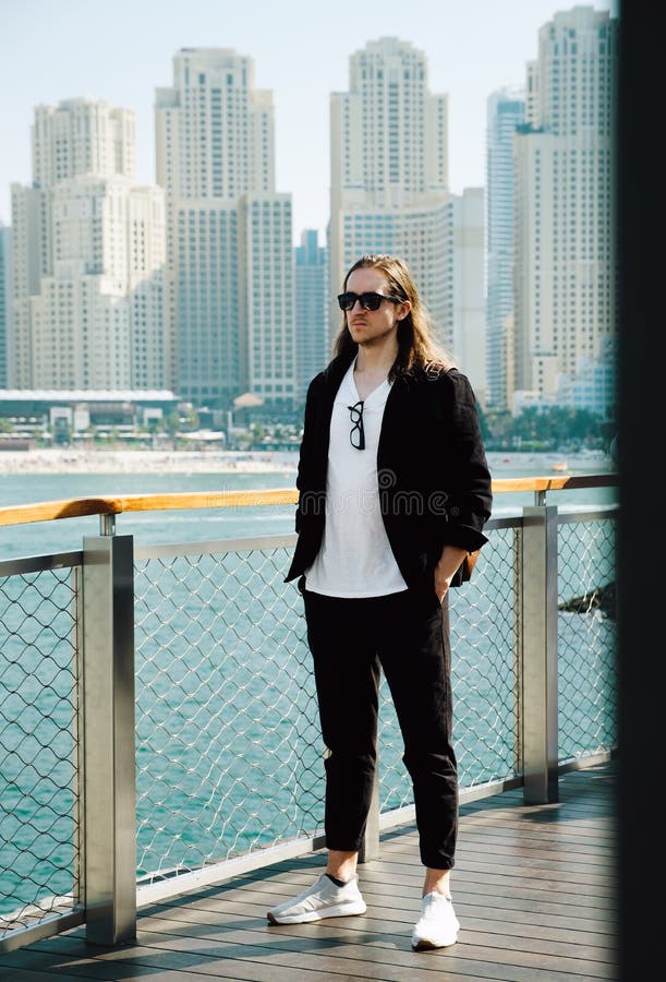 Man in Dubai stock image. Image of skyscraper, travel - 267932259