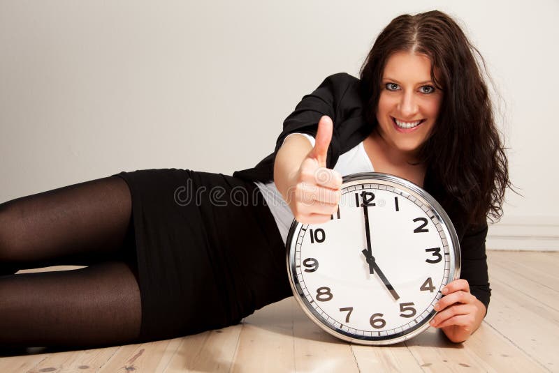 Confident Young Professional with a Clock Stock Image - Image of ...