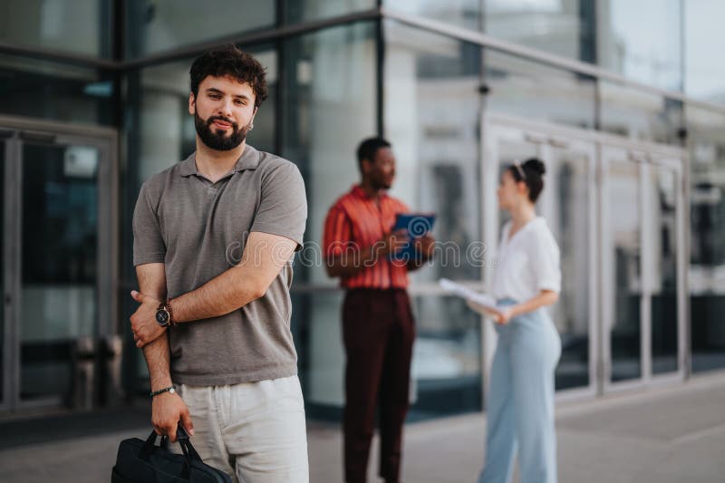 Confident Young Professional Outside Modern Office Building with ...