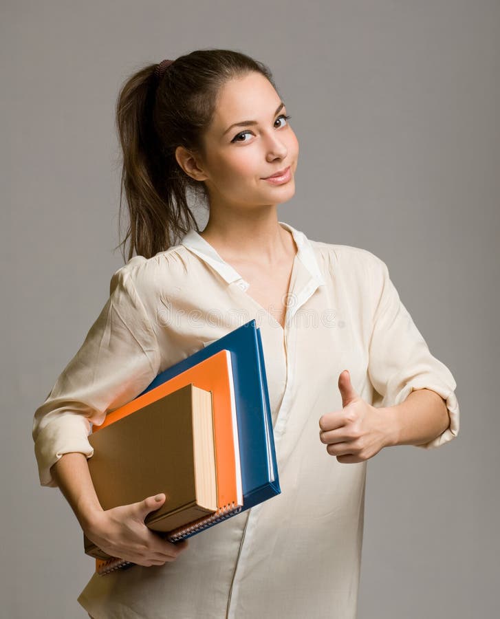 Confident Young Student Woman. Stock Photo - Image of ponytail, shirt ... Confident Young Student Woman. Stock Photo - Image of ponytail, shirt ...