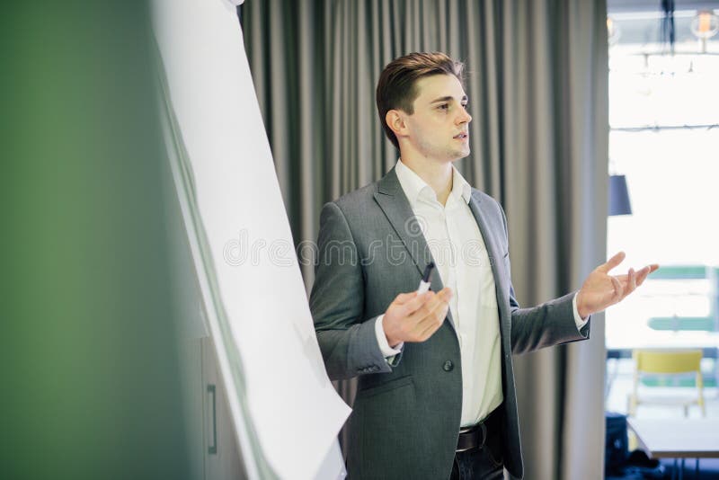 Confident Young Team Leader Manager Standing Front Flip Chart Present ...