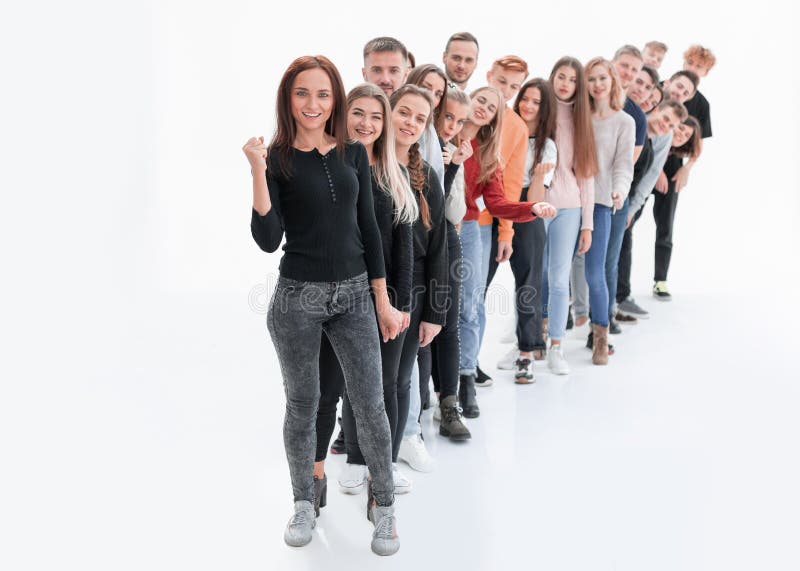 Confident Young Woman Standing in Front of a Column of Young People ...