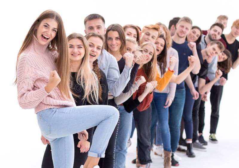 Confident Young Woman Standing in Front of a Column of Young People ...