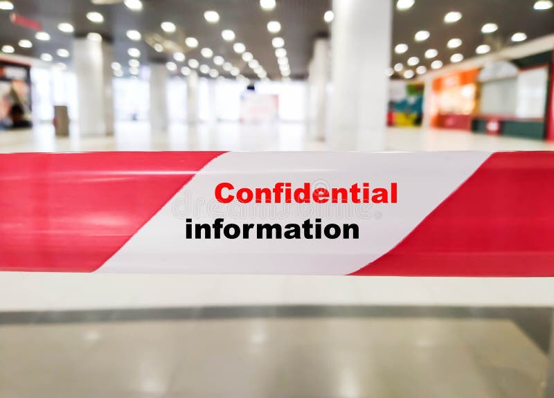 Confidential Information on Red Ribbon. Non-public Information Concept ...
