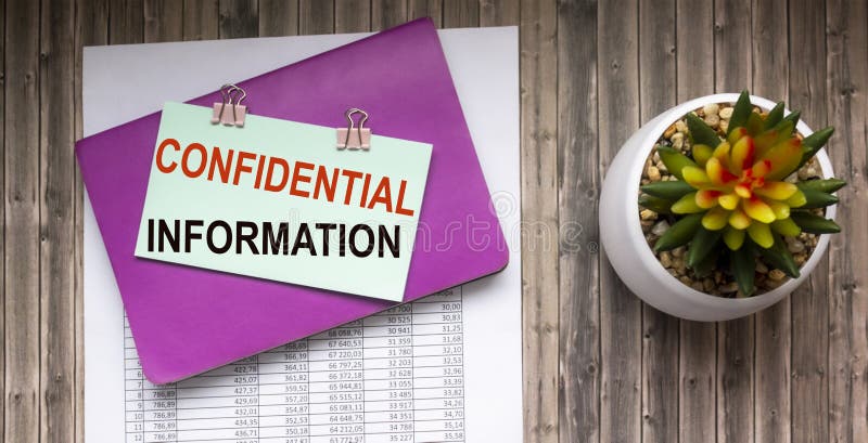 Confidential Information Text Written on the Table with Documents Stock ...