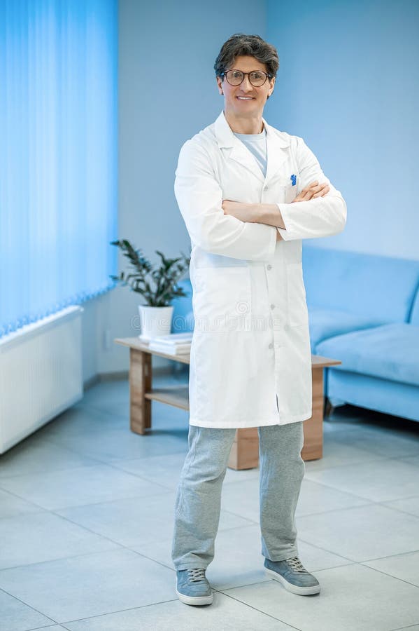Confindent Male Doctor Smiling and Looking Good Stock Photo - Image of ...