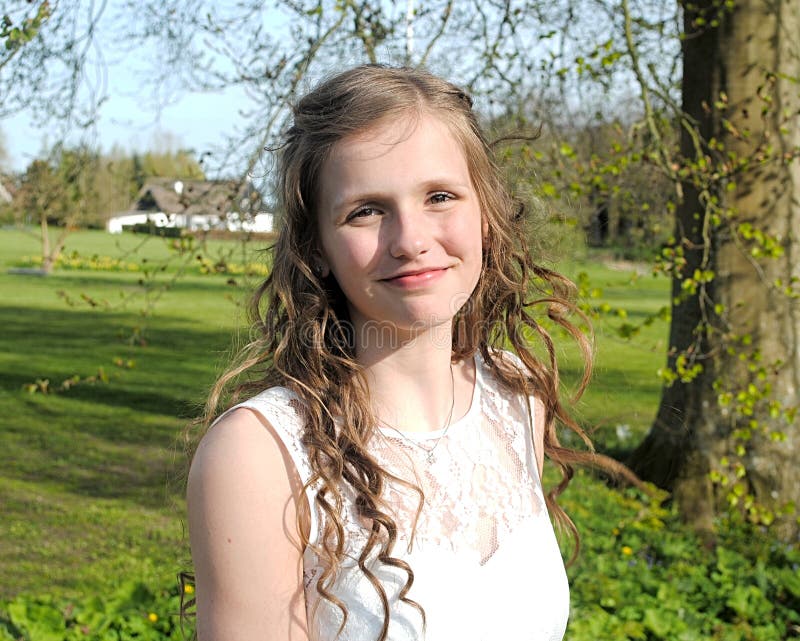 Confirmation stock photo. Image of sunshine, lady, girl - 100593830