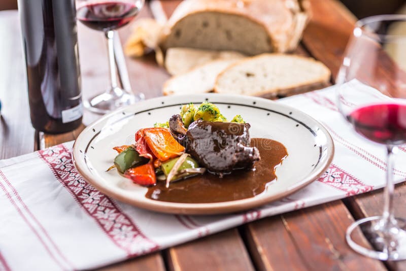 Confit Rabbit Leg with Vegetable Bread Redvine in Pub or Restaur Stock ...