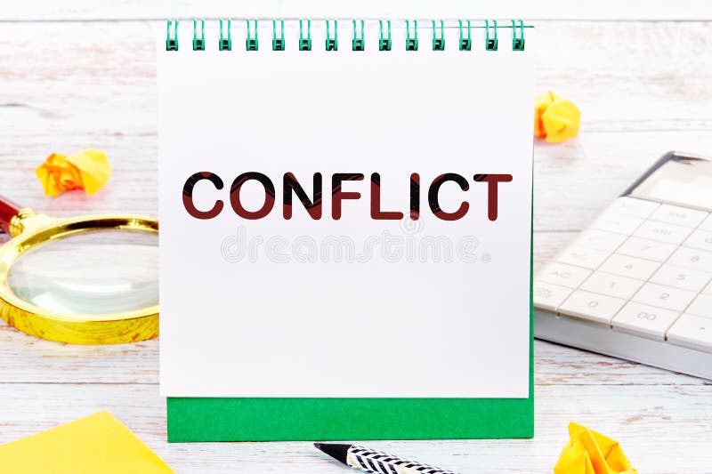 The Conflict Text is Written on a Notepad on the Manager S Desk Stock ...