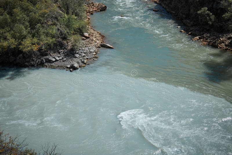 Confluence of Two Rivers of Different Colors Stock Image - Image of ...