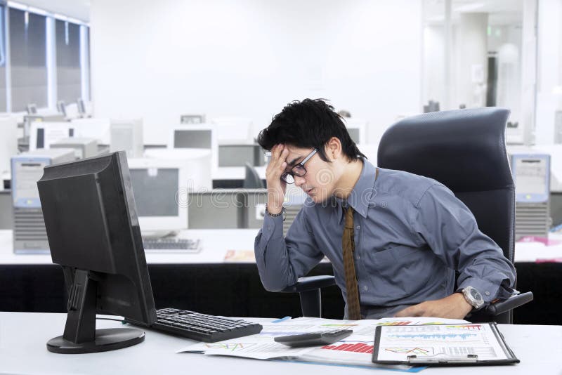 Confused Asian Businessman at Office Stock Image - Image of chart ...