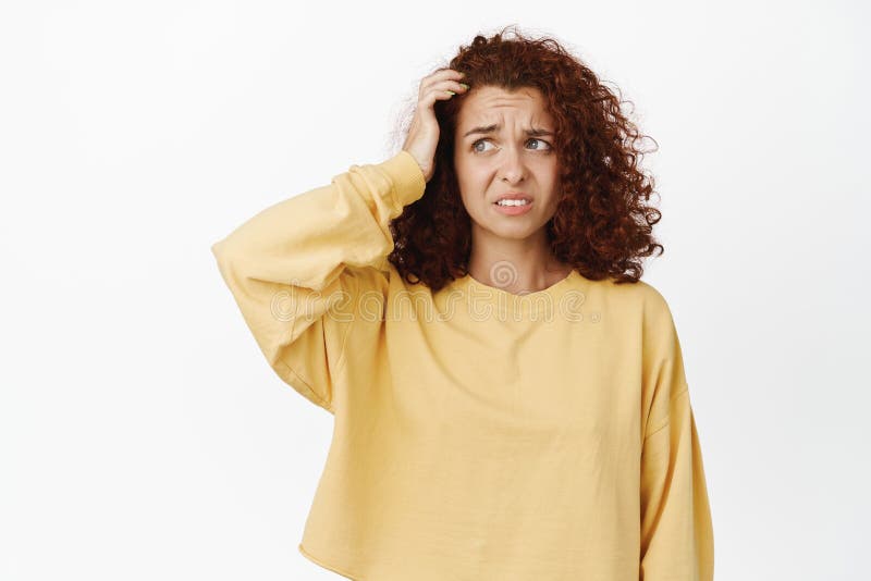 Awkward Girl Shrugging Shoulders With Apologizing Face Expression