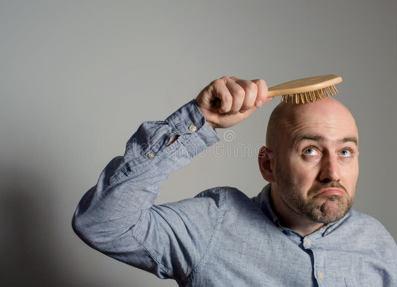 Confused Bald Man with Hair Brush Stock Photo - Image of caucasian ...