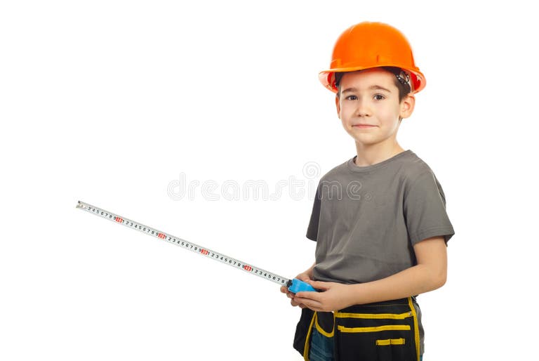 Confused boy holding ruler stock photo. Image of constructor - 18846432