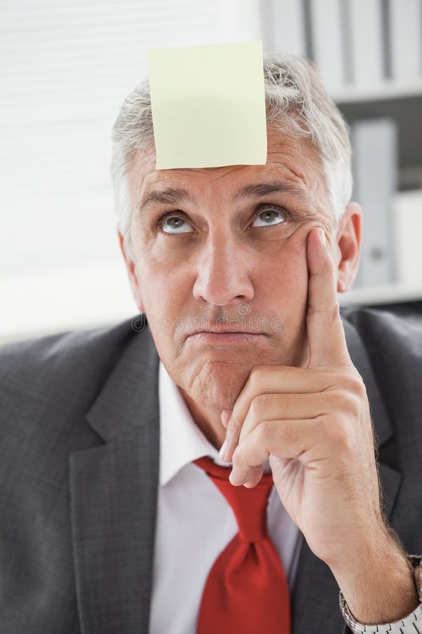 Confused Businessman with Sticky Note on Head Stock Image - Image of ...