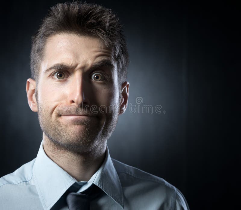 Confused businessman stock photo. Image of grimacing - 46757532