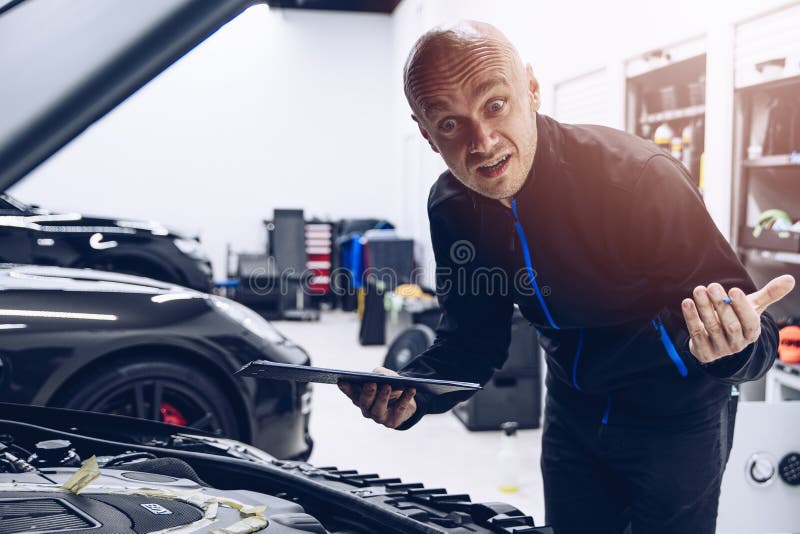 Confused mechanic stock image. Image of repair, uncertain - 9084949
