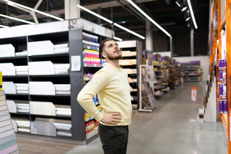 Confused Customer Looks Around the Hardware Store Stock Image - Image ...
