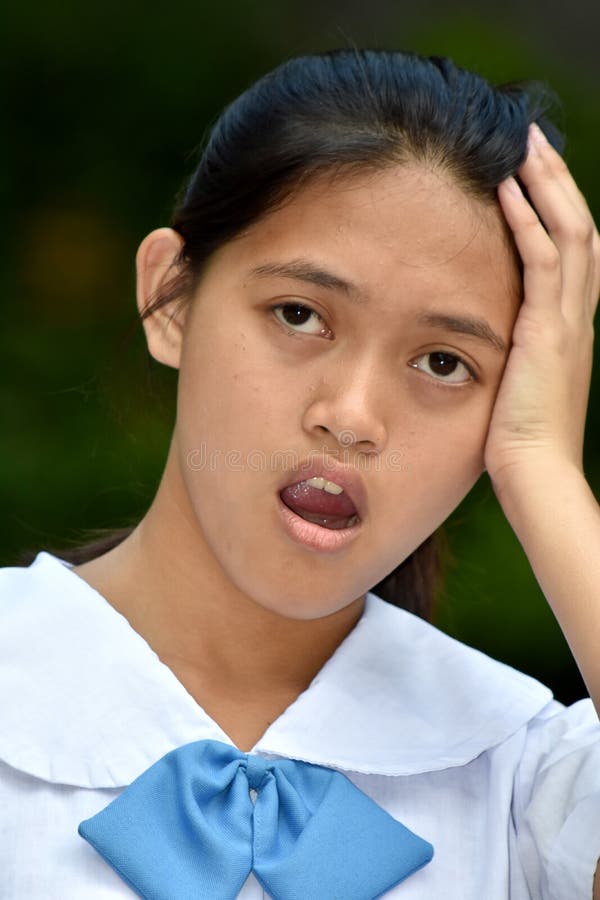 Confused Cute Asian Youth stock image. Image of youngsters - 141850757