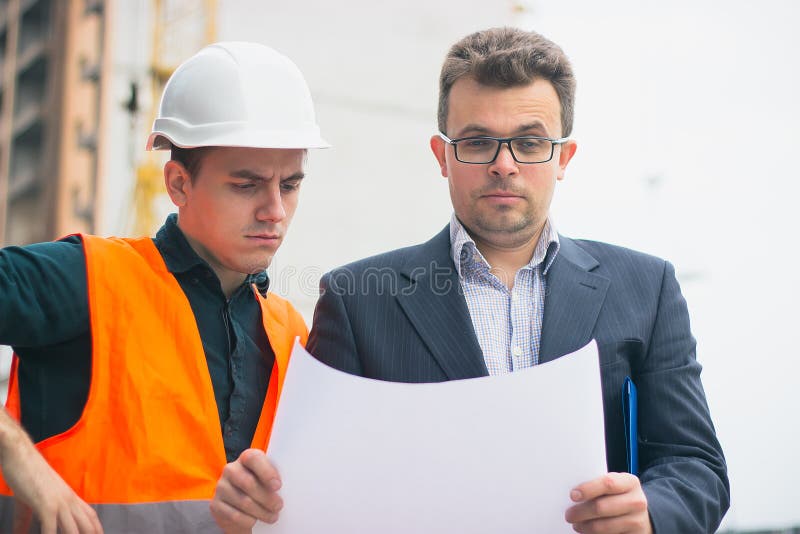 Engineer Boss with Protective Safety Helmet Checking Architectural ...