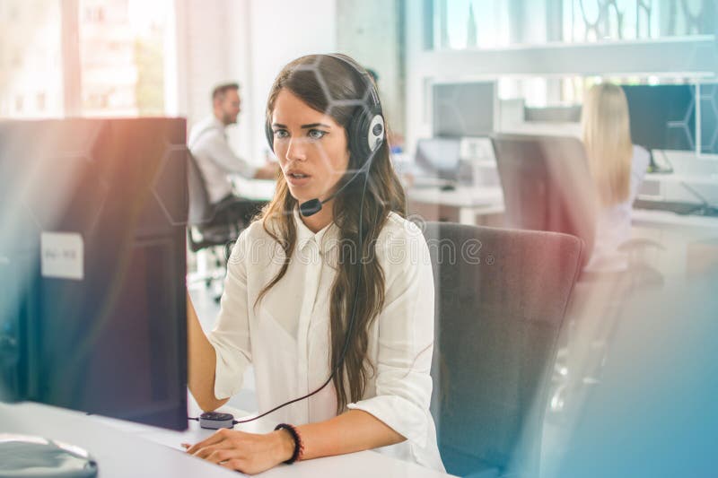 Confused Female Customer Support Operator Looking at Computer Screen ...