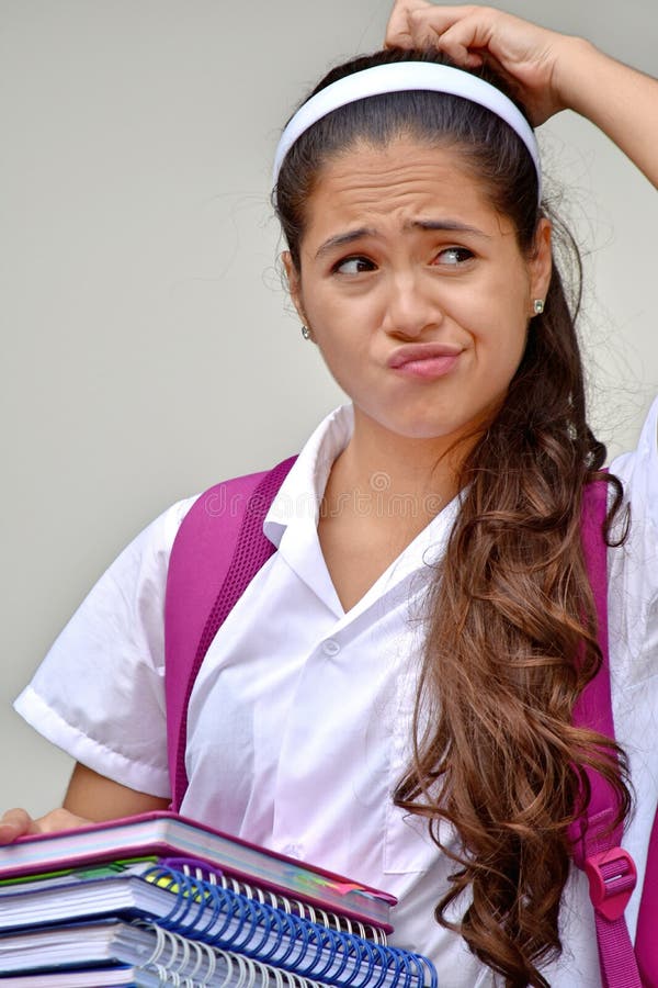 A Confused Female Hispanic Student Stock Image - Image of thinking ...