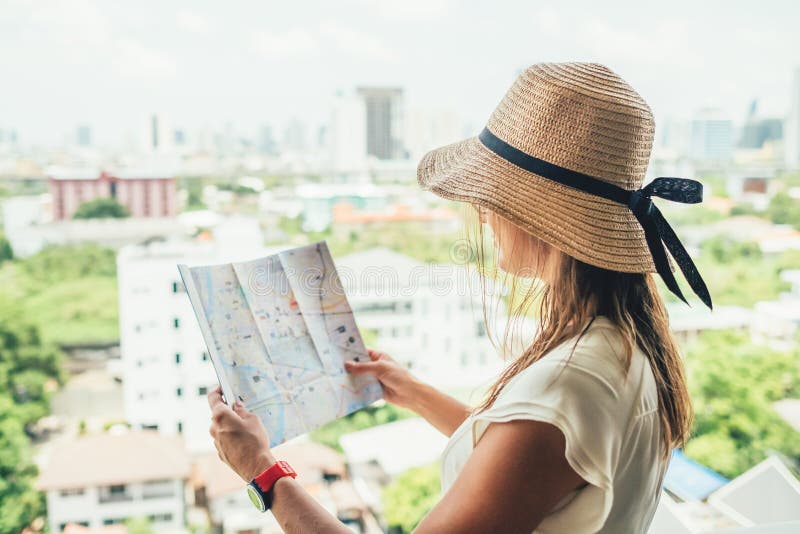 Confused Female Looking To Destination on Map Stock Image - Image of ...