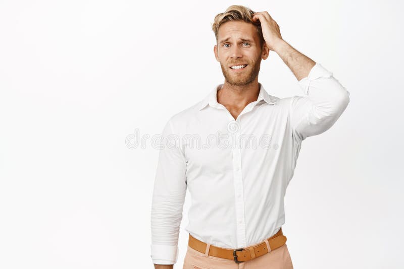 Confused Handsome Adult Man Scratch His Head Smiling And Looking