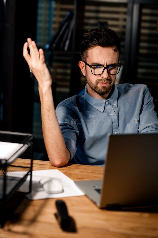 Confused Man Having Problems at Work Stock Photo - Image of problem ...