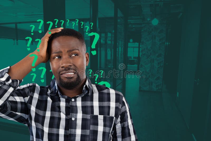 Confused Man Holding His Head Looking on the Right in an Office with ...