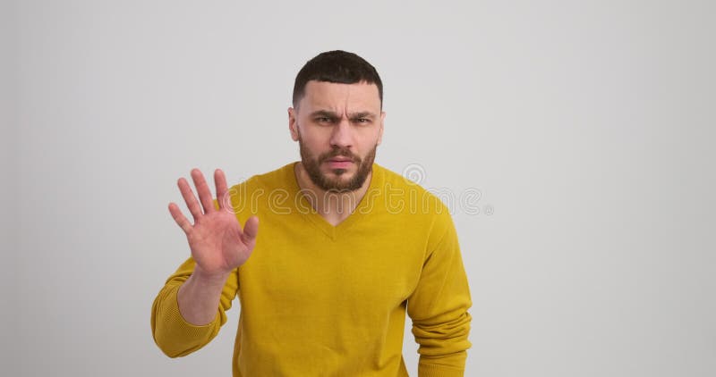 Confused man waving hand stock video. Video of tshirt - 142400565