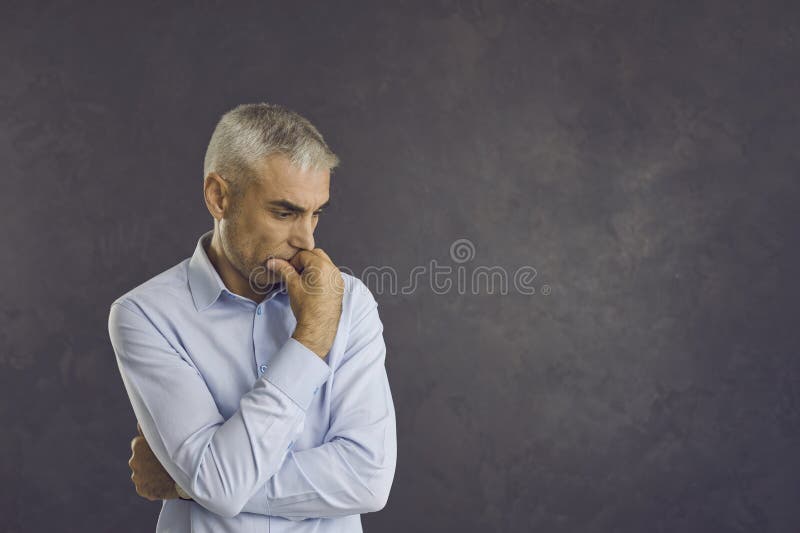 Confused Mature Man Thinking about Something Important Standing on a ...