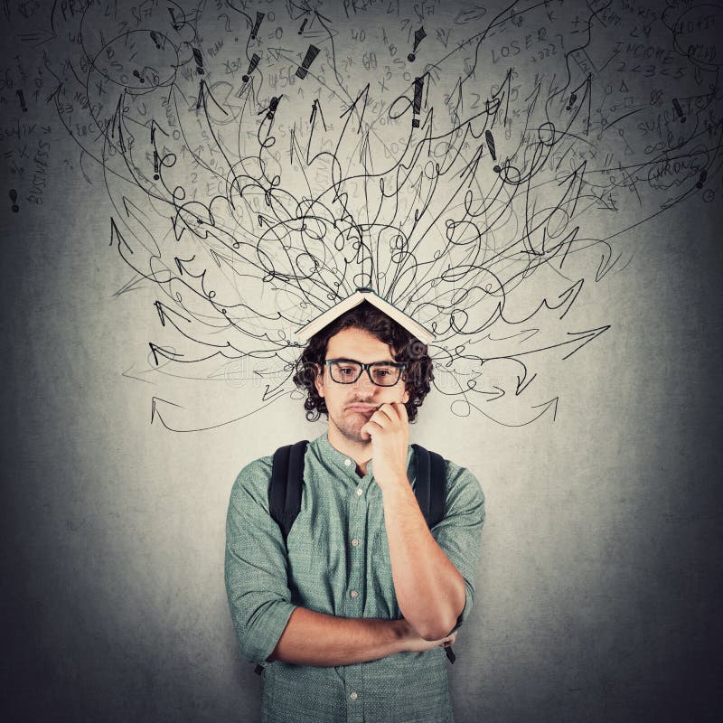 Confused and Perplexed Student Guy Keeps Hand Under Cheek, Holding a ...