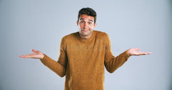 Confused, Portrait and Shrugging Shoulders with Man in Studio for Doubt ...