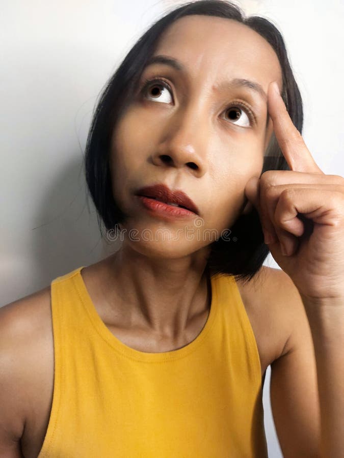 A Confused Pretty Asian Adult Stock Photo - Image of beauty, attractive ...