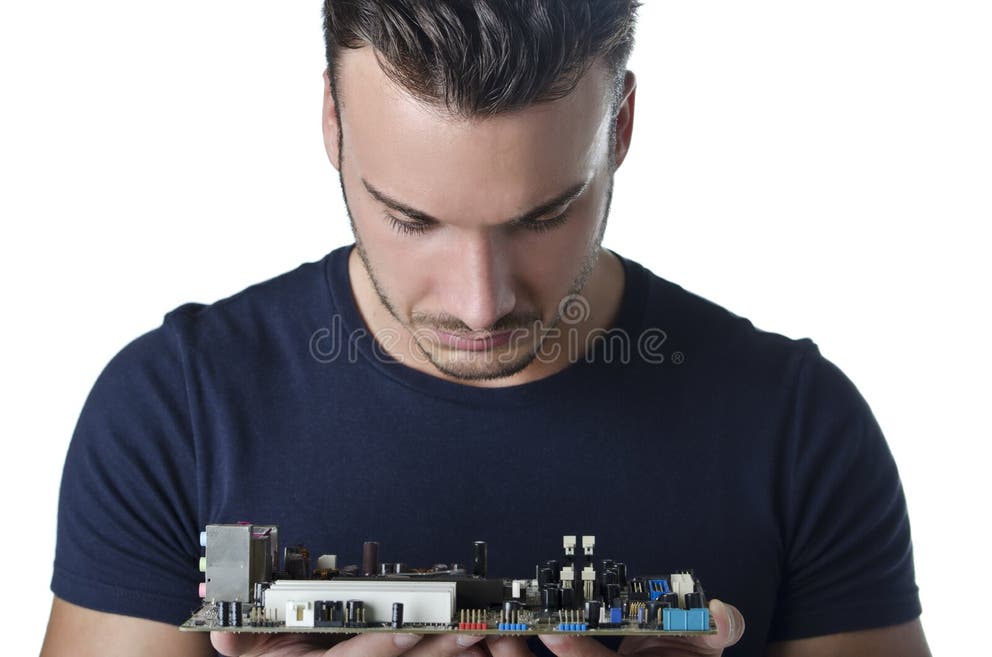 Confused, Puzzled Computer Technician Looking at Motherboard Stock ...