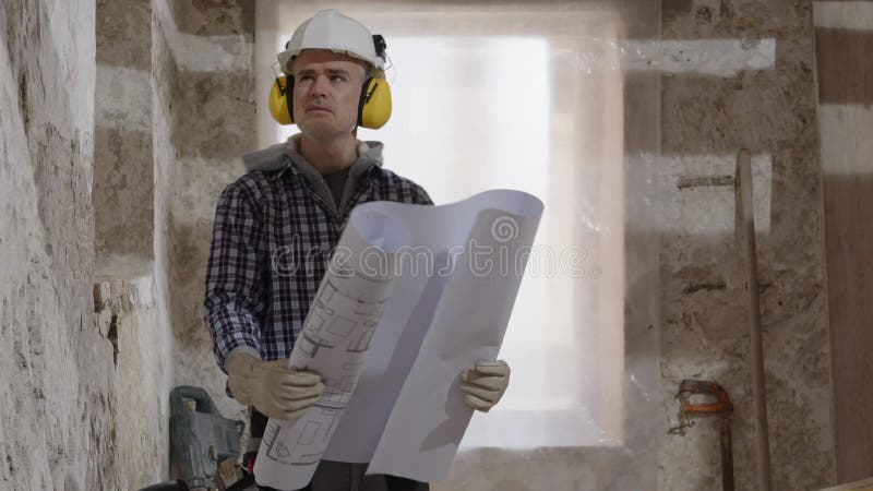 Confused Puzzled Construction Builder Worker at a Renovation Building ...