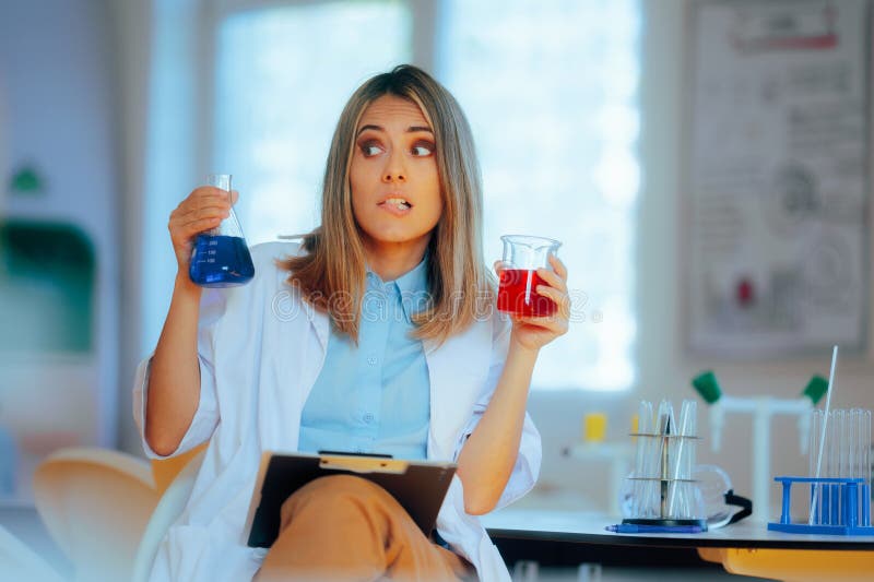 Puzzled Chemist Holding Two Substances Comparing Them Stock Image ...