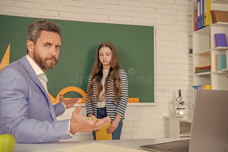 Confused School Man Measure with Ruler Isolated on Yellow. School Man ...