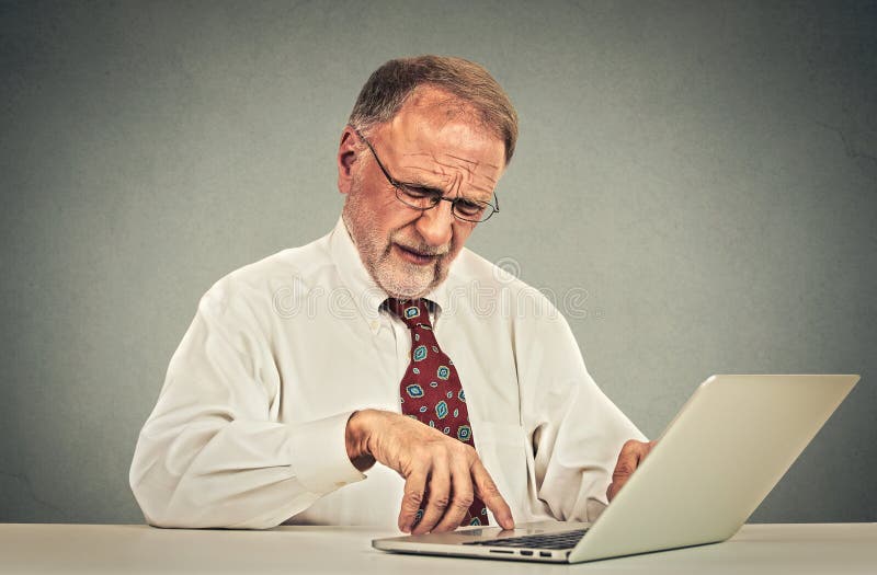 Confused Senior Man Working on Laptop Computer Stock Photo - Image of ...