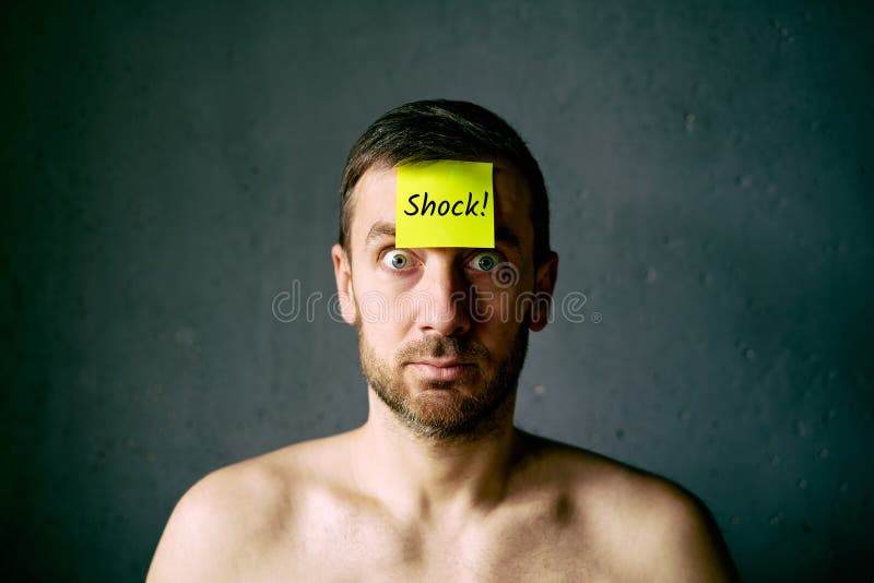 Confused Shocked Man with Yellow Sticky Note on His Forehead Stock ...