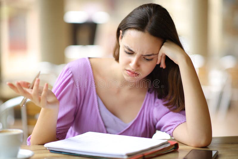 Confused Student Checking Lesson in a Bar Stock Photo - Image of ...