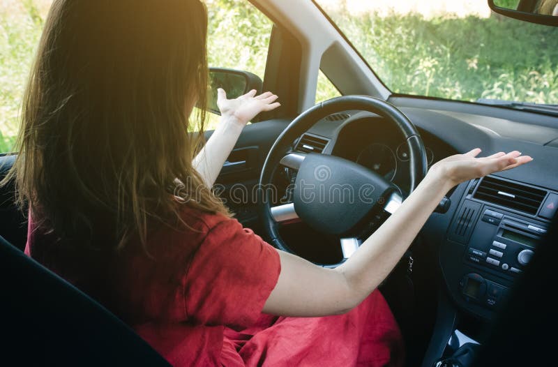 Confused Woman Behind the Wheel. Unknown Situation while Driving Stock ...