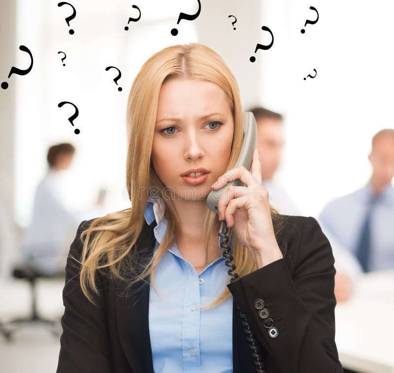 Confused Woman with Phone in Office Stock Photo - Image of ...