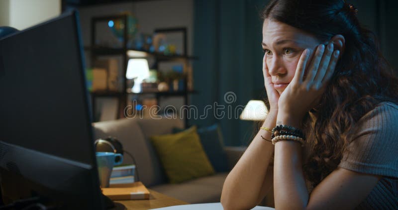 Confused Woman Staring at the Computer Screen Stock Photo - Image of ...