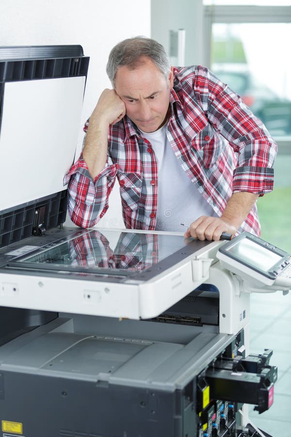 Confused Computer Repair Man Stock Image - Image of professional ...