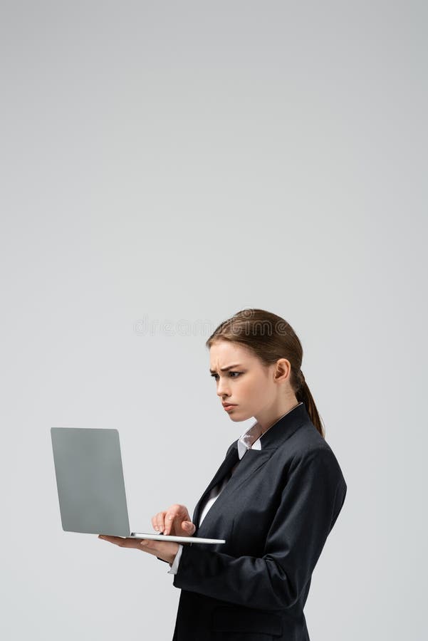 Confused Young Businesswoman Using Laptop Isolated Stock Image - Image ...