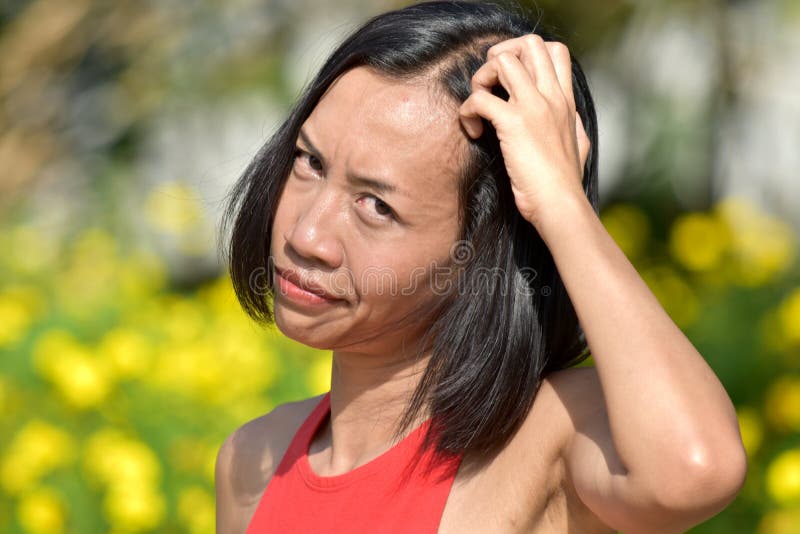 Confused Young Filipina Female Stock Photo - Image of confused, thought ...